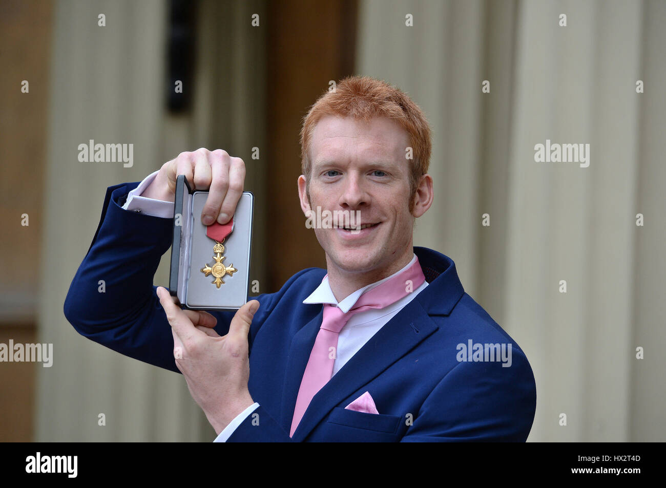 Cyclist Ed Clancy with his OBE after receiving it from the Prince of ...