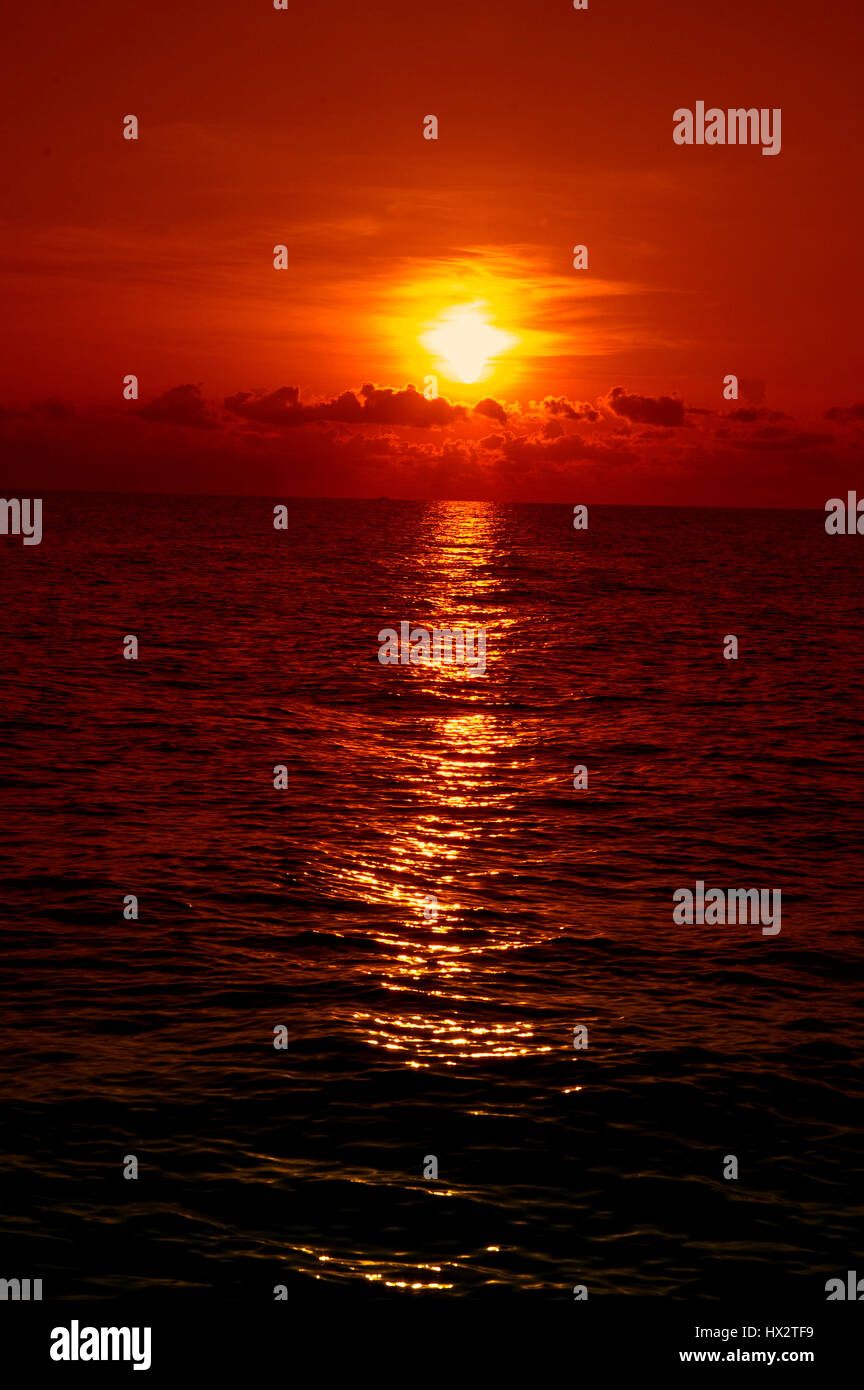 red ocean sunset Stock Photo - Alamy