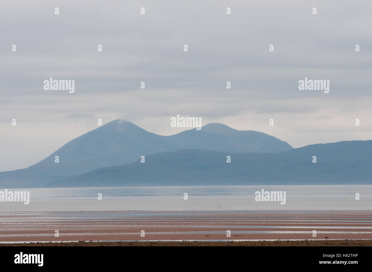 The shell beach at Applecross, Scotland looking across the sea to the ...