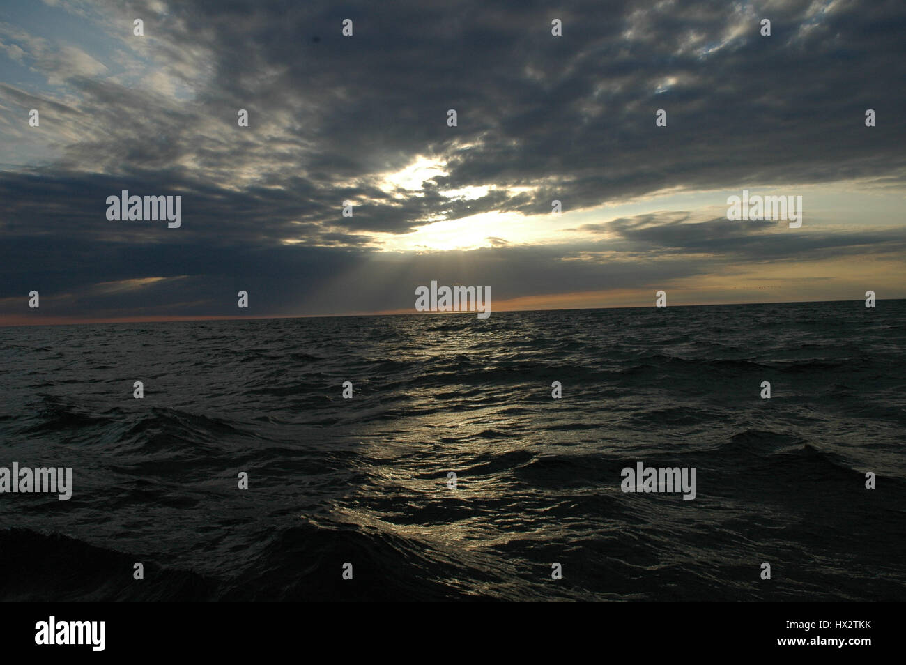 Light coming through clouds hi-res stock photography and images - Alamy