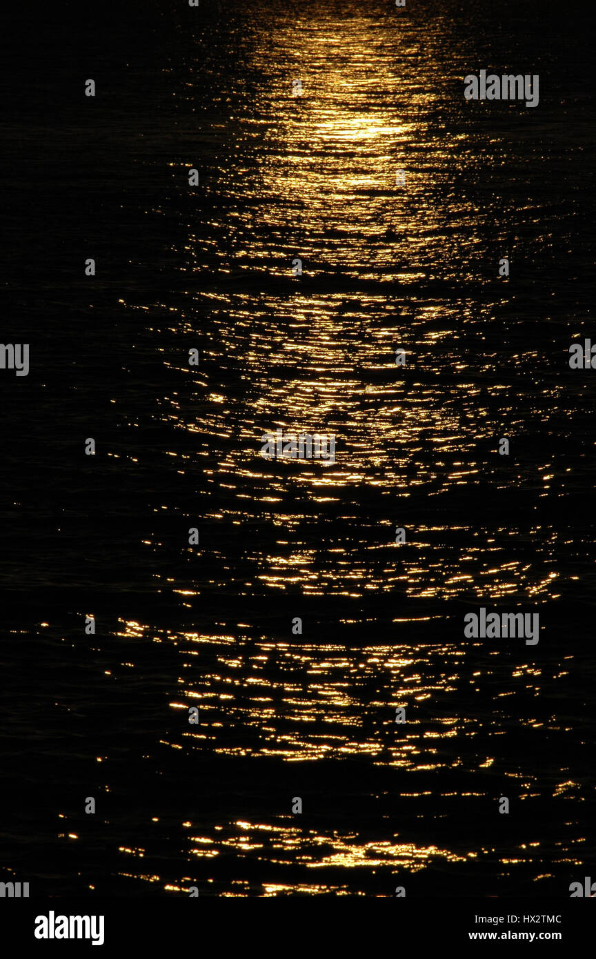 background light on ocean water Stock Photo - Alamy