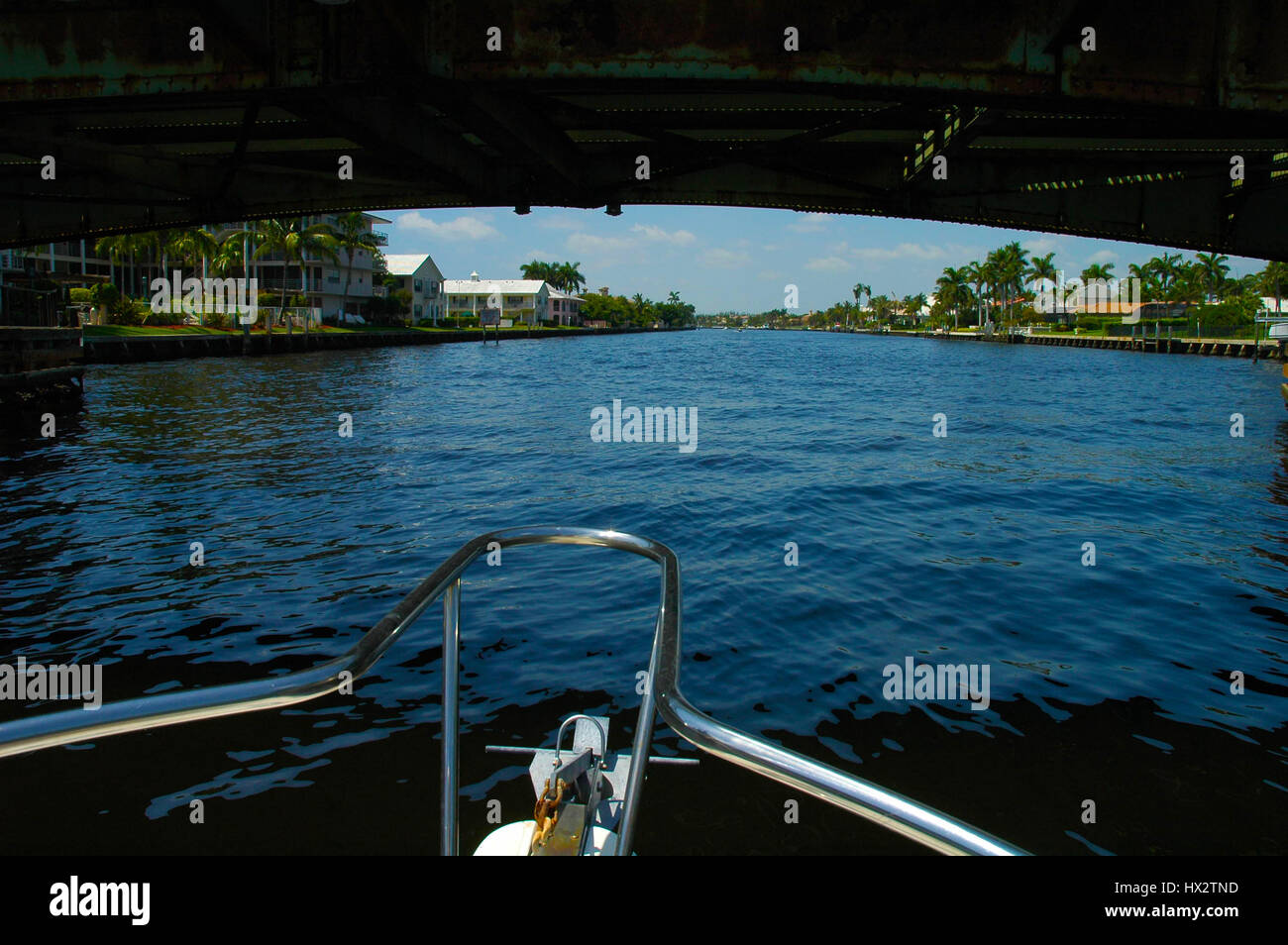 bow of boat going under bridge Stock Photo - Alamy