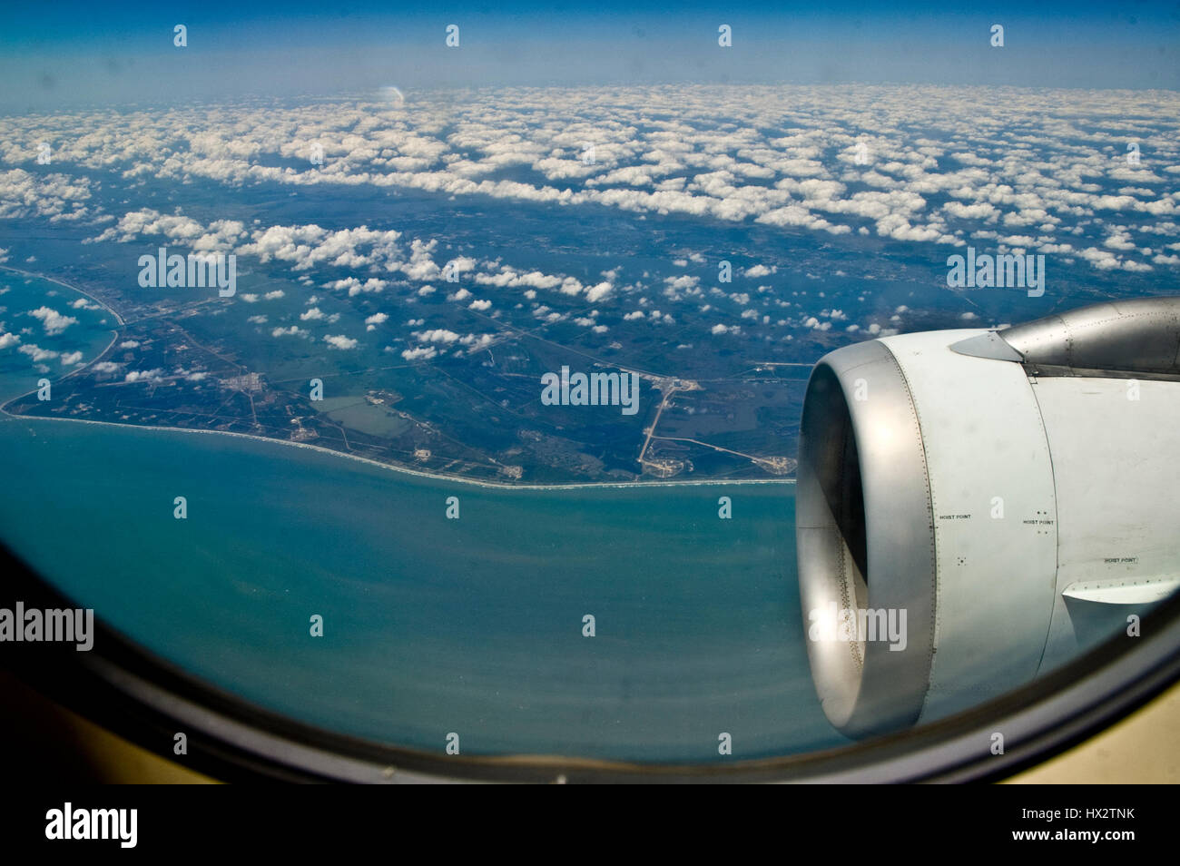 looking out jet window see engine and water Stock Photo - Alamy
