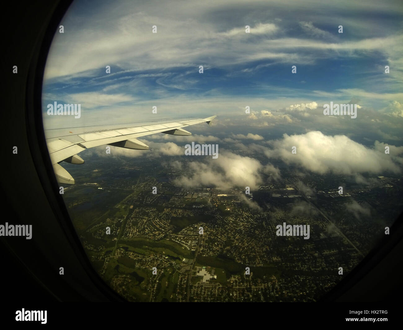 wing and clouds out window Stock Photo - Alamy