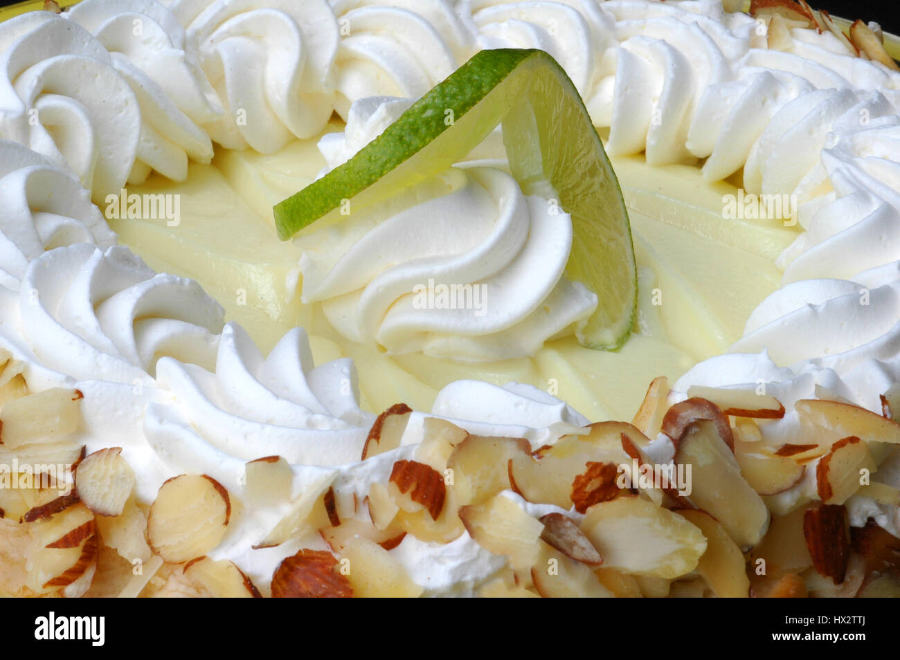 key lime pie with almonds and whipped cream Stock Photo - Alamy