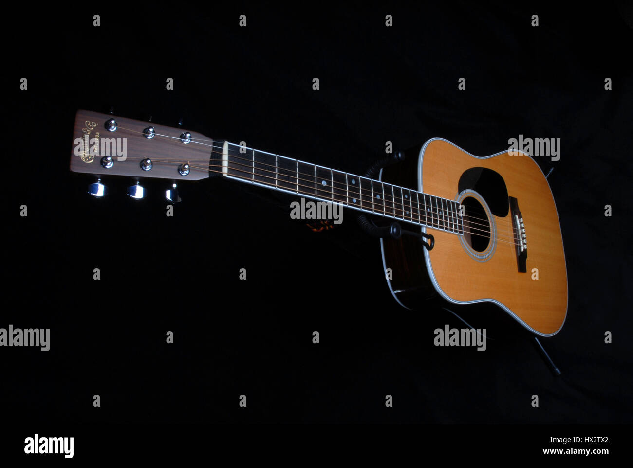six string acoustic full guitar Stock Photo - Alamy