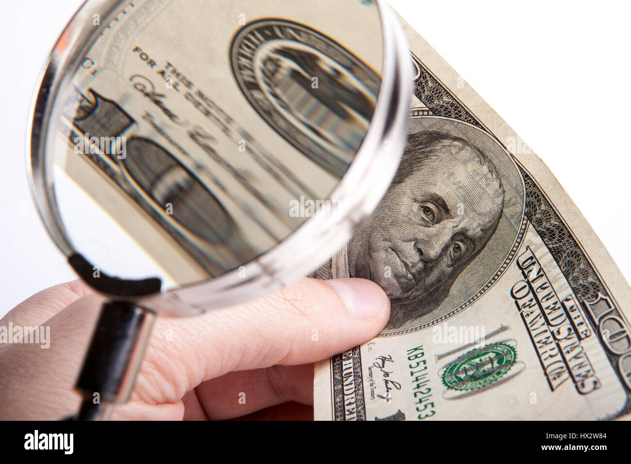 Banknote check for authenticity Stock Photo - Alamy