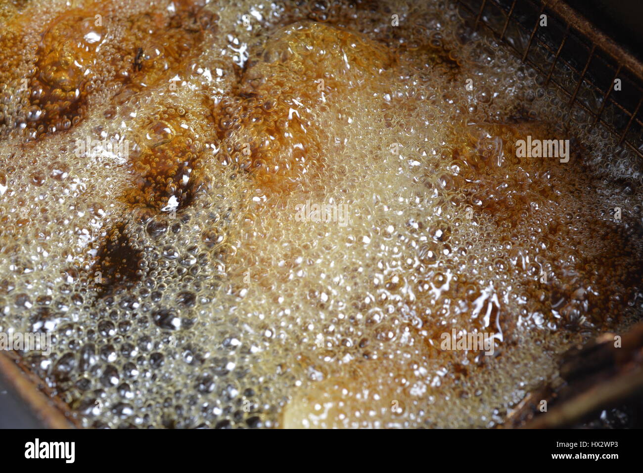deep fryer cooking close up Stock Photo - Alamy