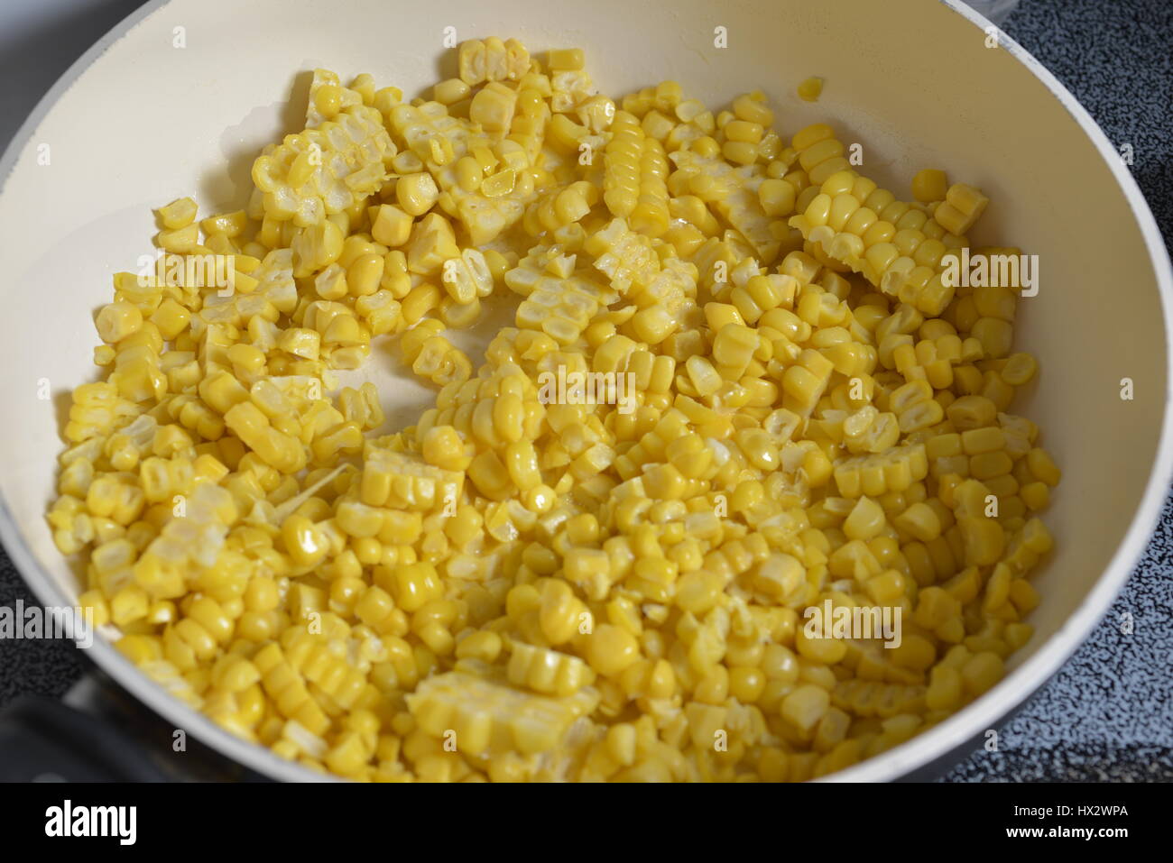 cooking cut corn in pot Stock Photo - Alamy
