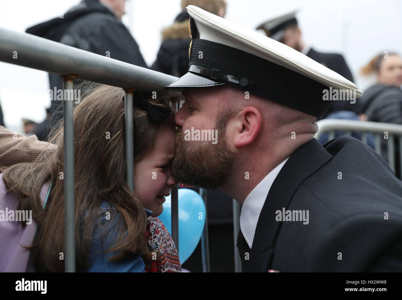 PABEST Petty Officer Adam Jeffrey (right) is greeted by his daughter ...