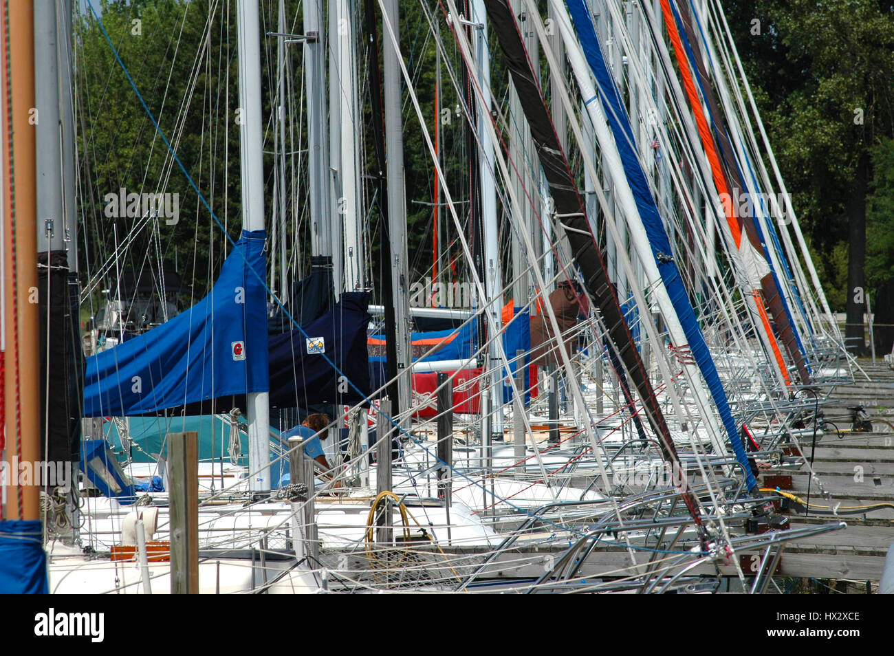 sailboat masts docked Stock Photo - Alamy