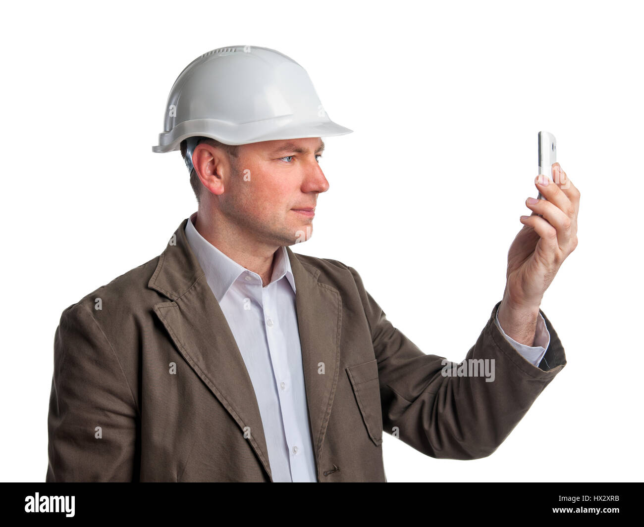 Construction supervisor examining window hi-res stock photography and ...