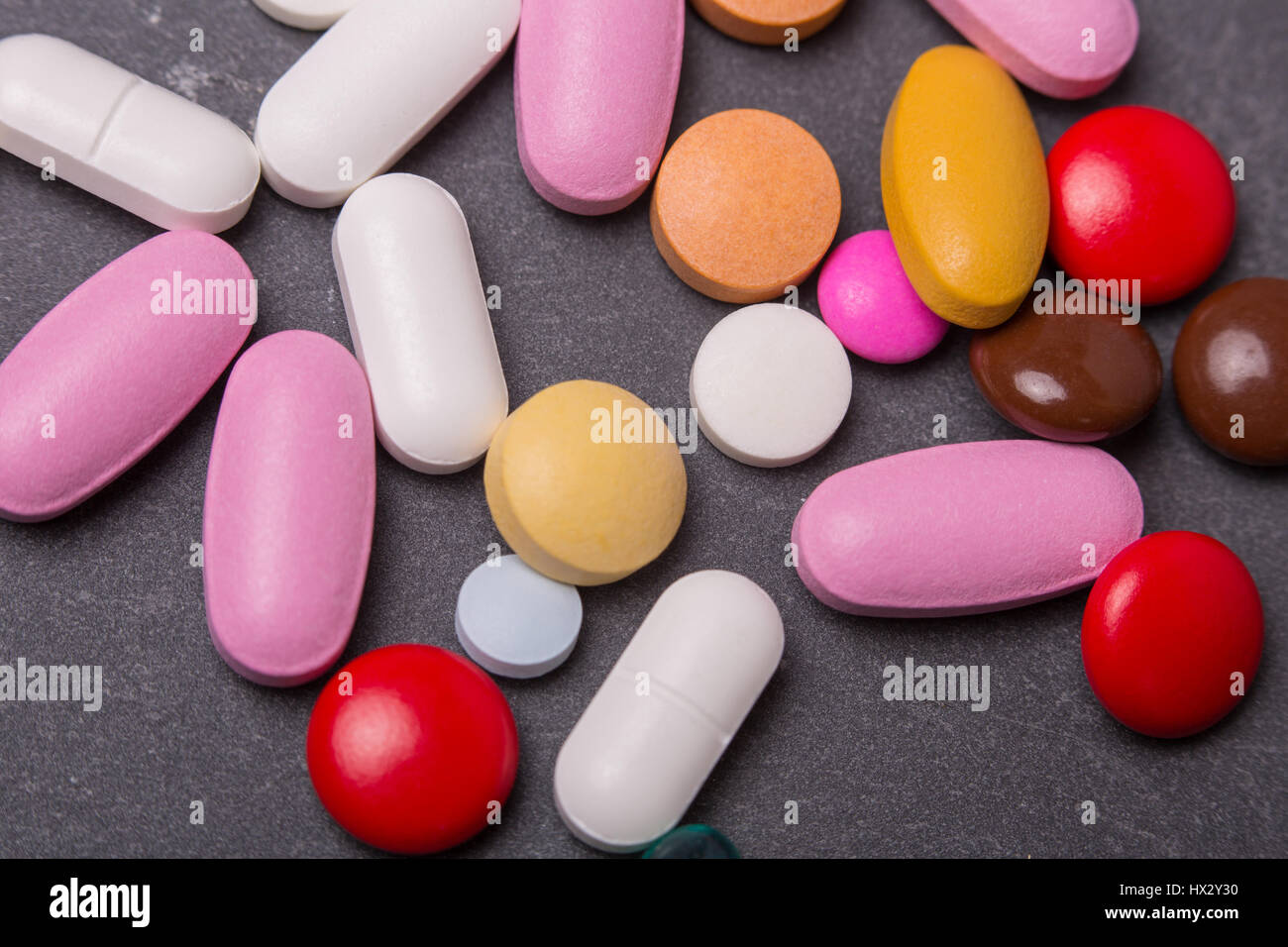 different tablets pills capsule heap mix therapy drugs Stock Photo - Alamy