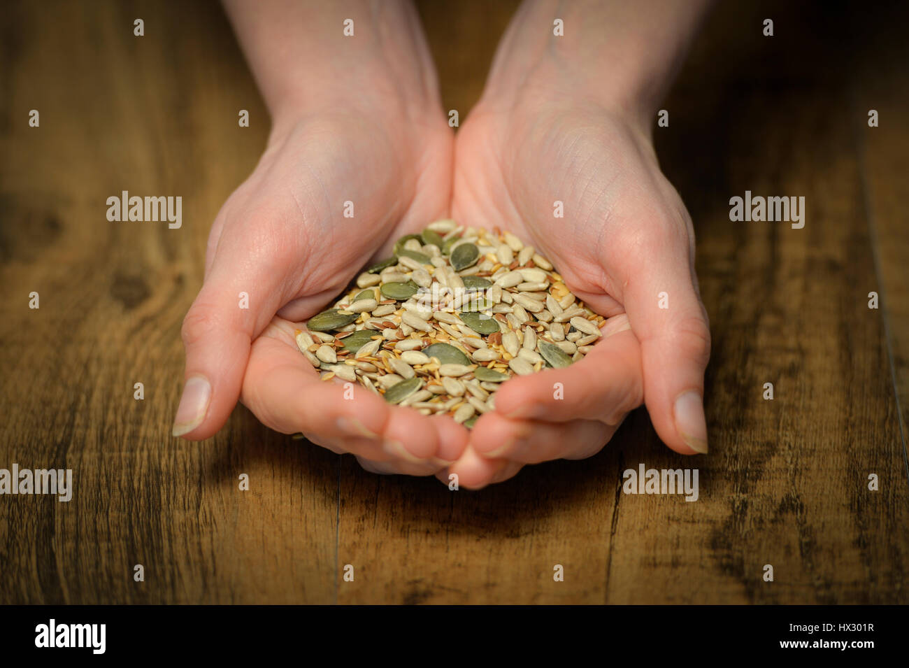 Handful nuts hi-res stock photography and images - Alamy