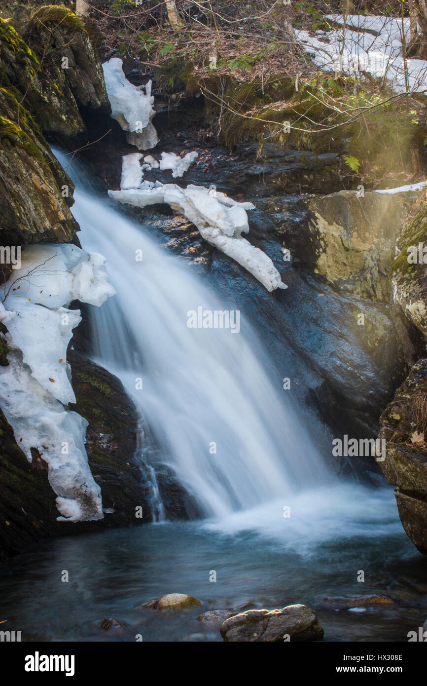 waterfall in the forest with snow Stock Photo - Alamy