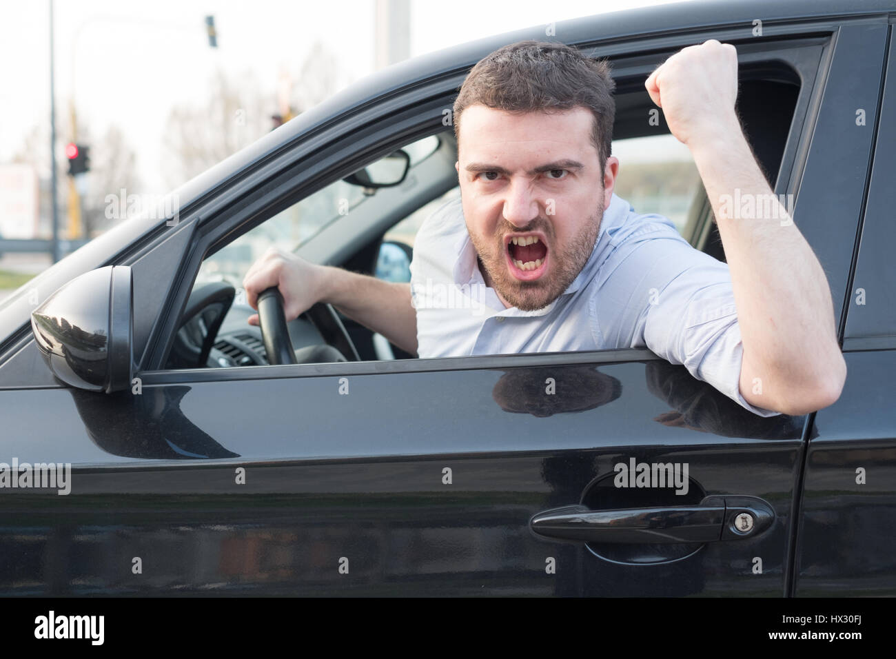 Angry man driving car hi-res stock photography and images - Alamy