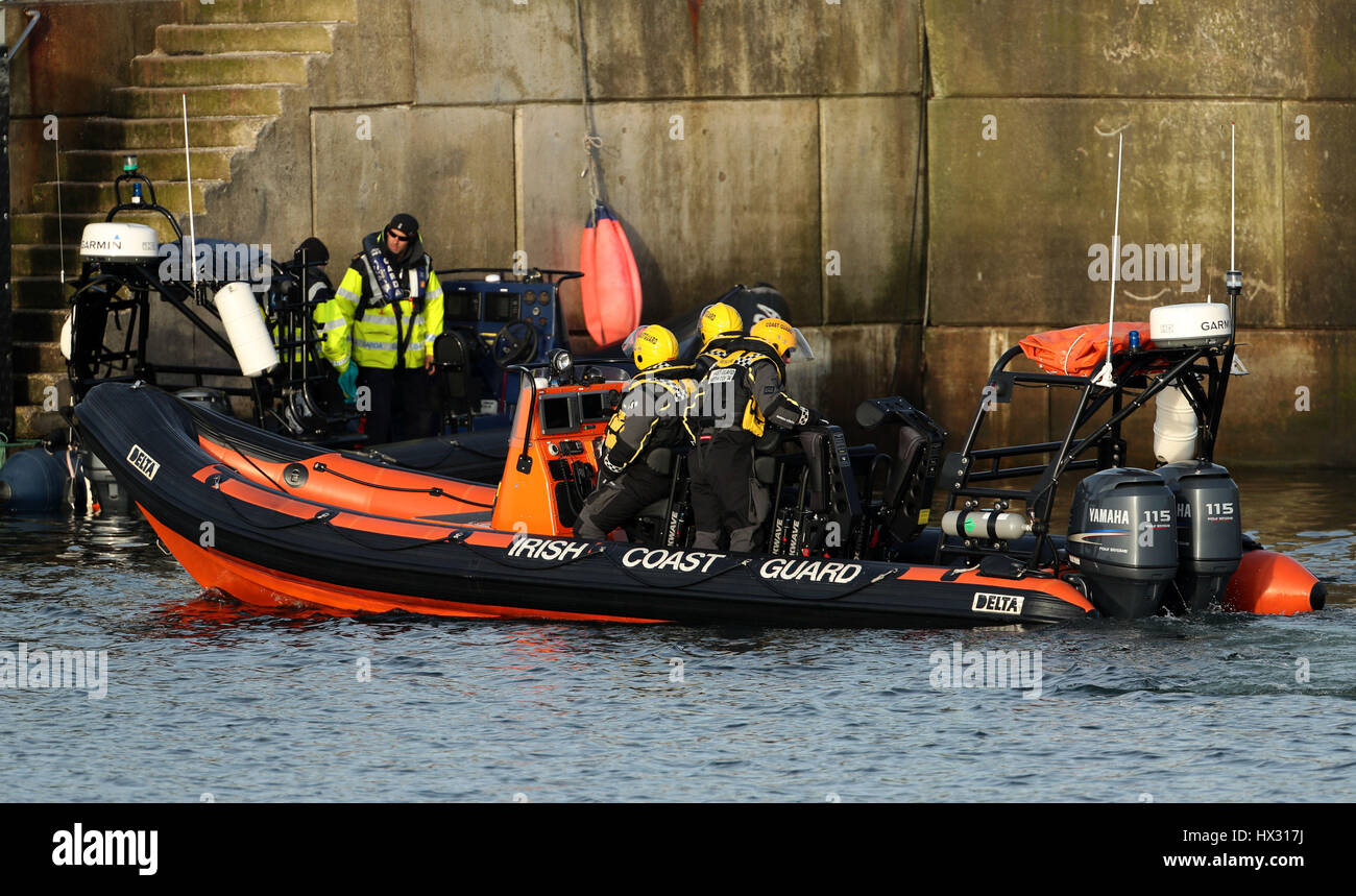 Garda And Members Of The Irish Coastguard Alongside The Quay At
