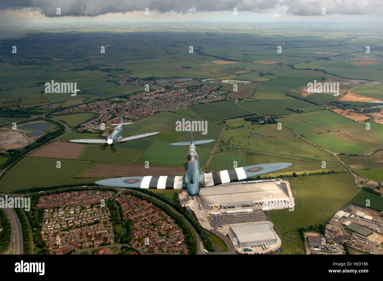 Two Battle of Britain Memorial Flight spitfires in formation,flying ...