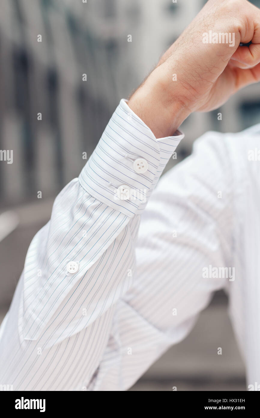 Close up of a businessman's shirt cuffs Stock Photo - Alamy