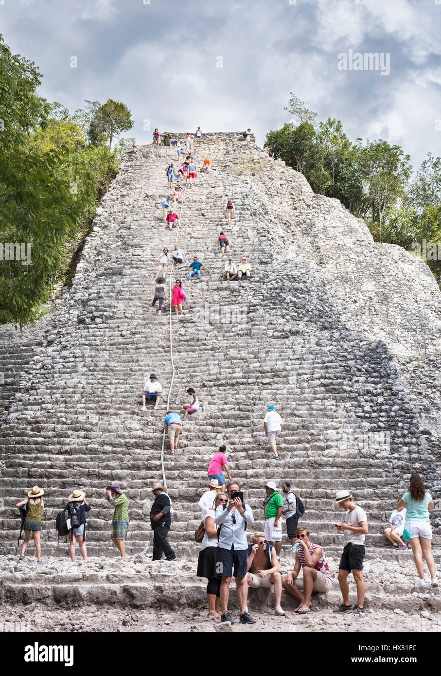 Tourists at the Pyramid Nohoch Mul of the Mayan Coba Ruins, Mexico ...