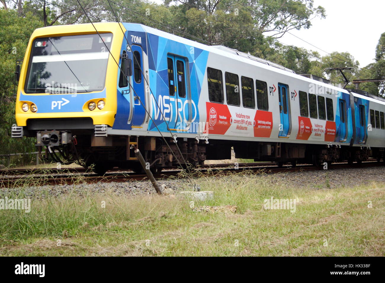 Melbourne metro train travelling between Ferntree Gully and Boronia ...