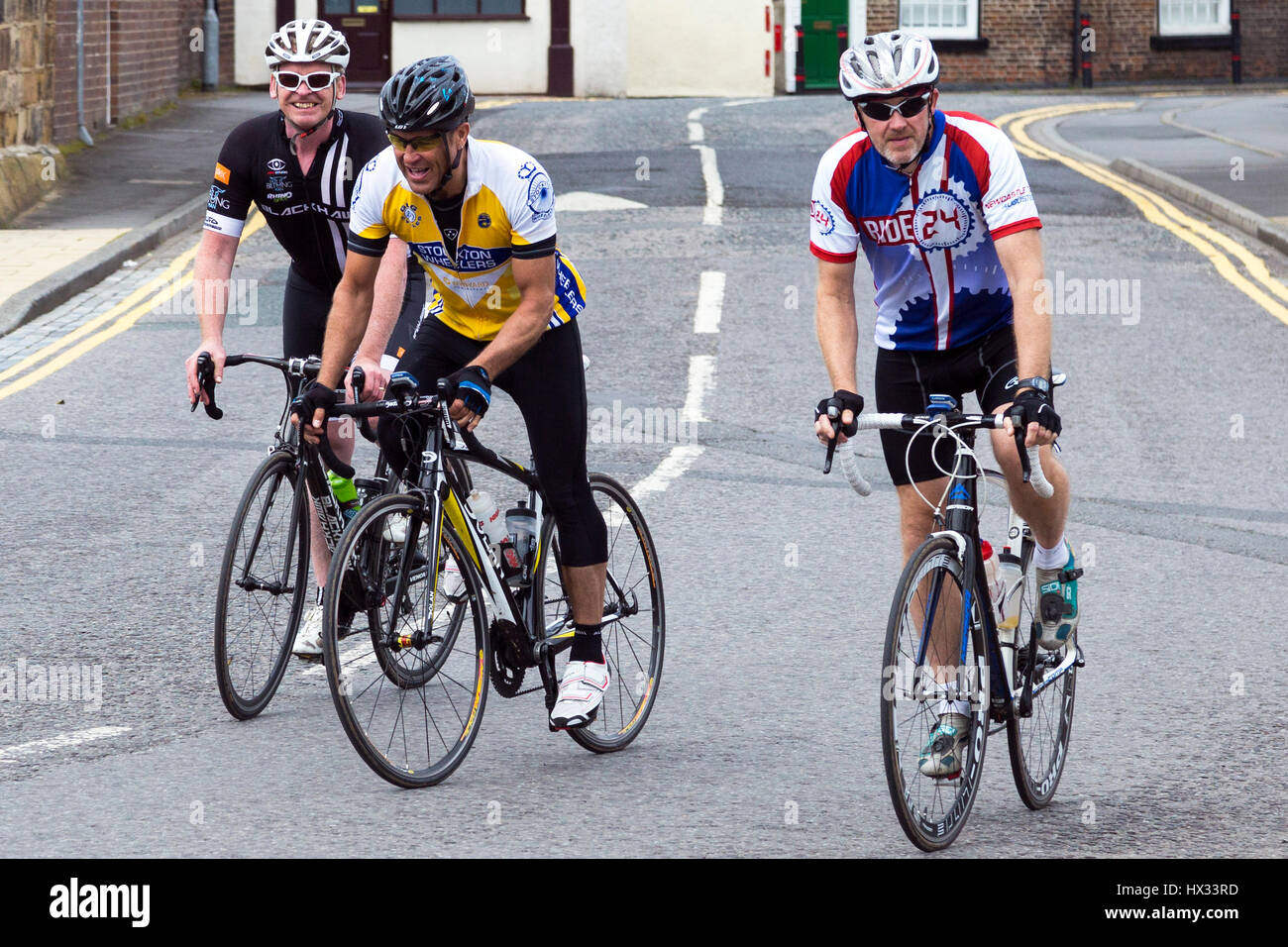 Cyclists in Stokesley, North Yorkshire, England, UK Stock Photo - Alamy