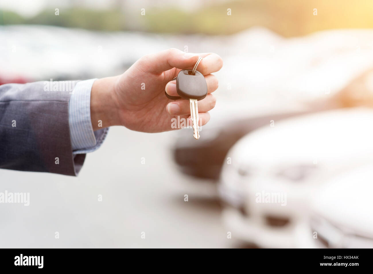 Handing key cars hi-res stock photography and images - Alamy