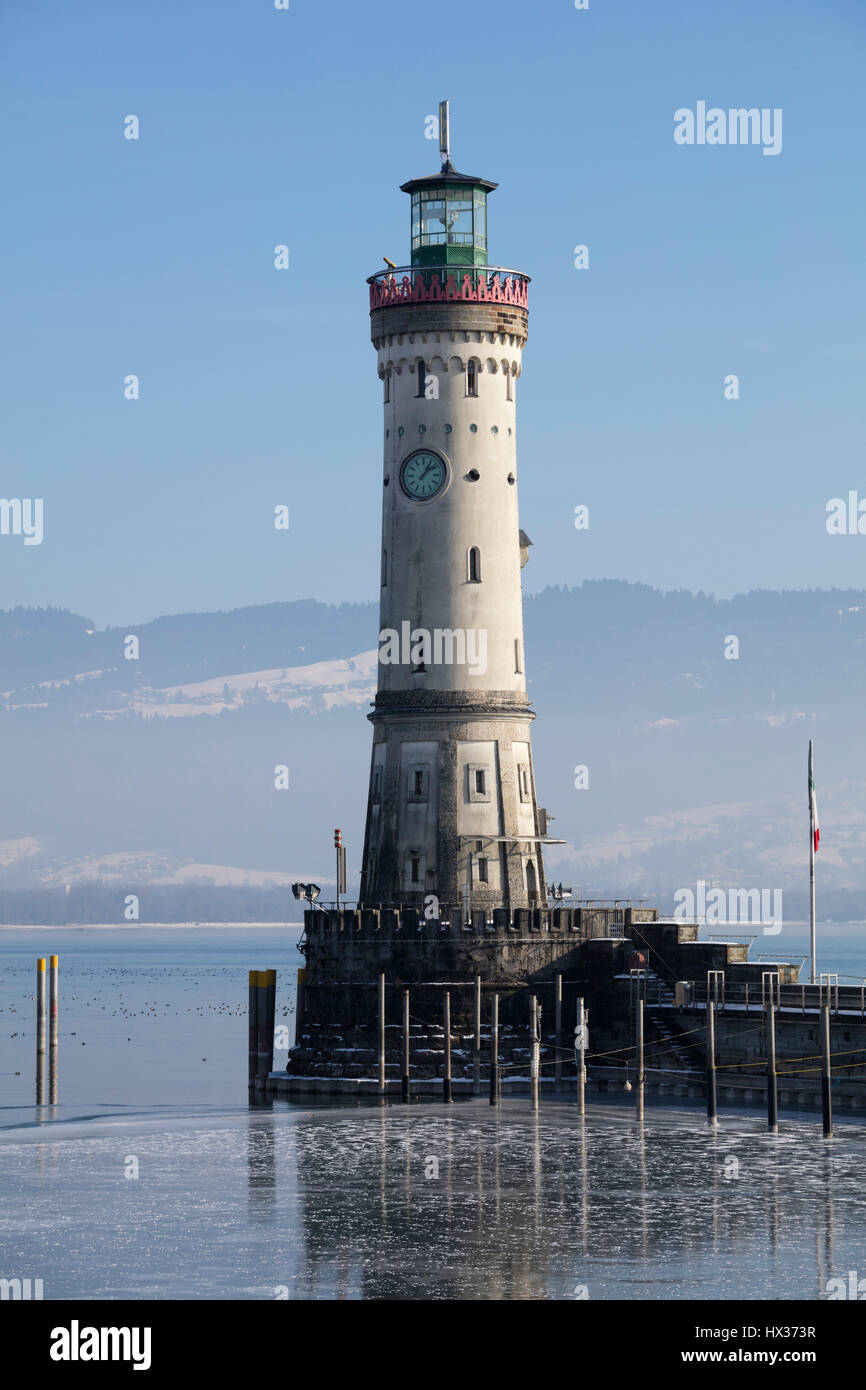 Harbor entrance in winter, New Lighthouse, Lindau, Lake Constance ...