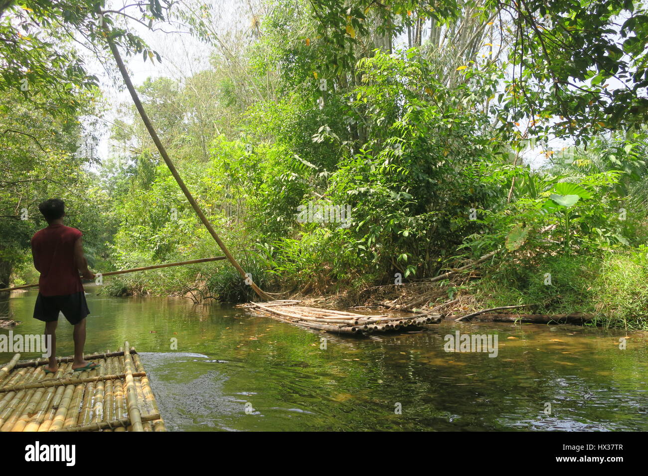 Man standing on raft stick hi-res stock photography and images - Alamy