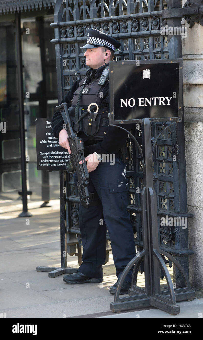 Armed police at Carriage Gates, one of the entry points to the Palace ...