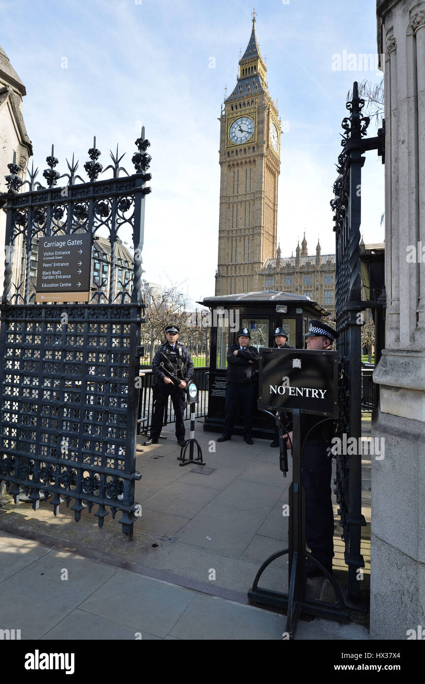 Armed police at Carriage Gates, one of the entry points to the Palace ...