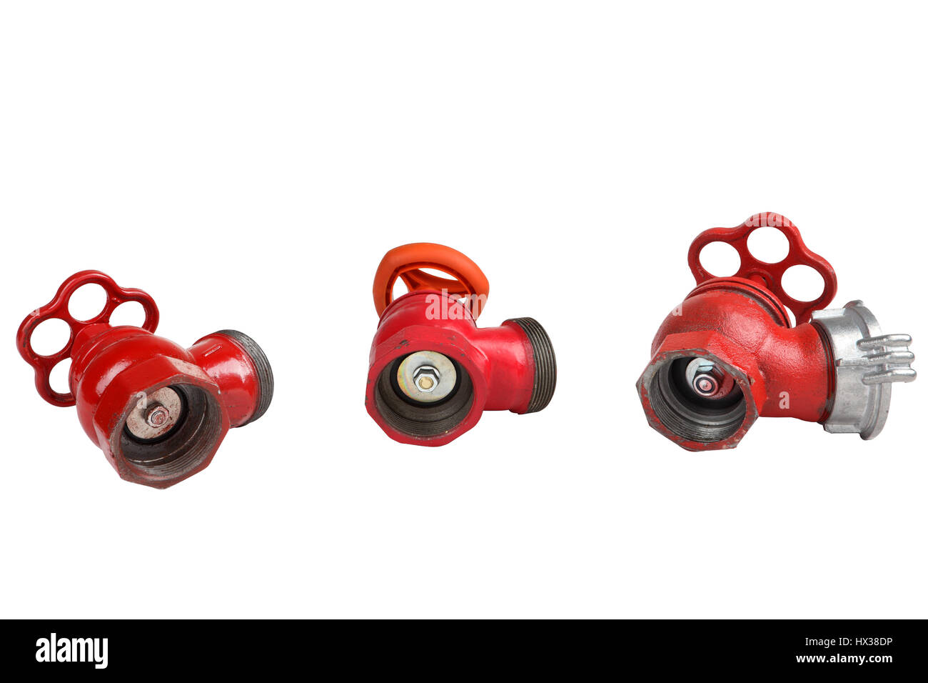 Set of three red, cast-iron fire valve to regulate the water pressure ...
