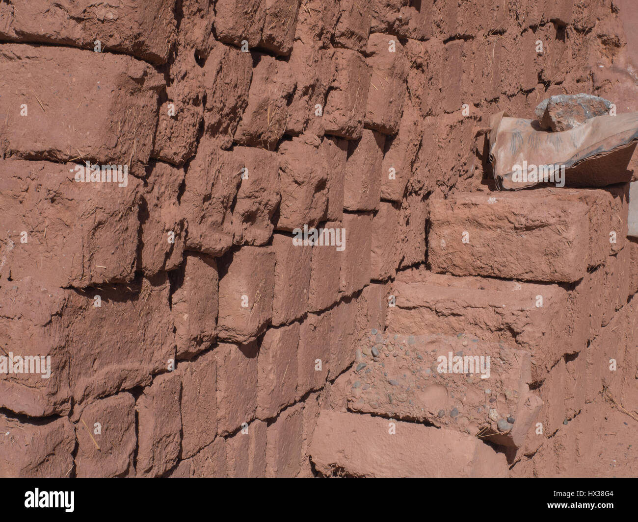 Red bricks made of clay, dried on the sun Stock Photo - Alamy