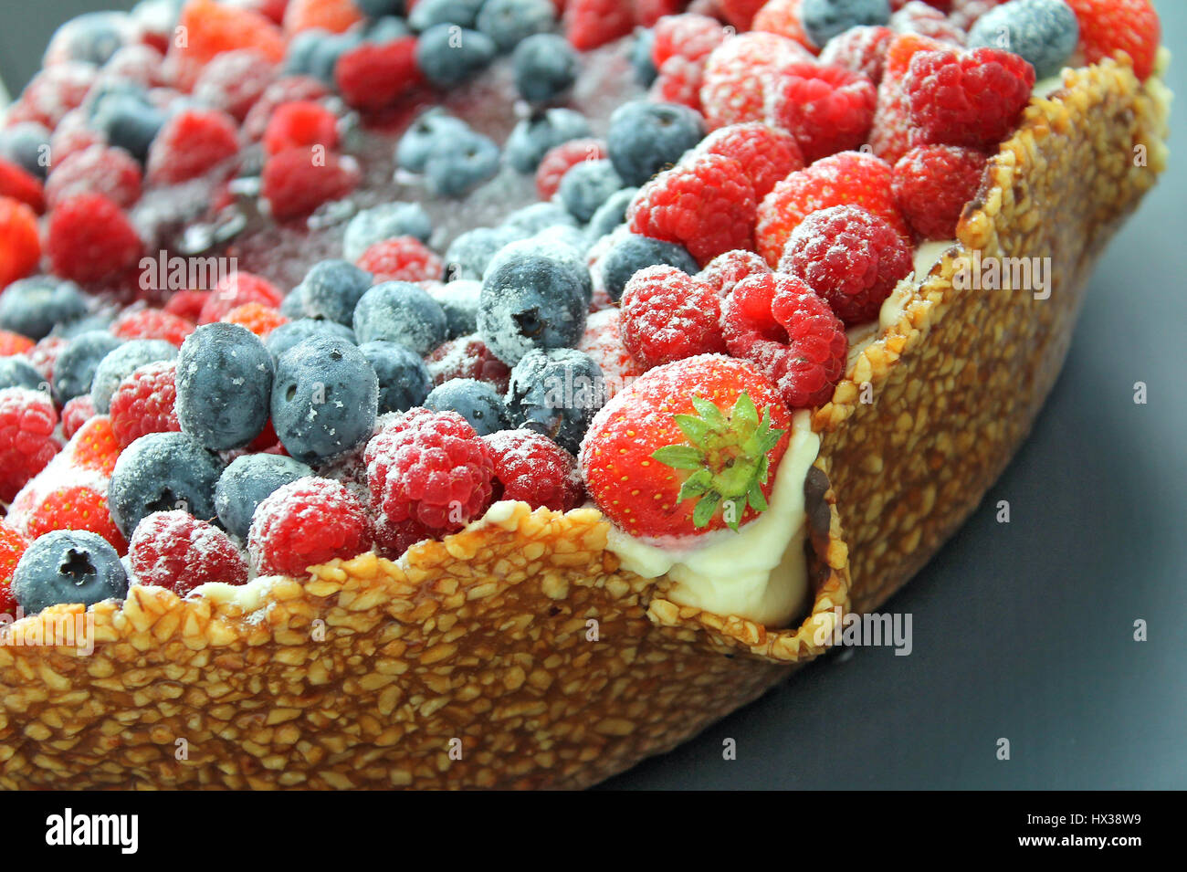 Mixed fruit of the forest cake Stock Photo - Alamy