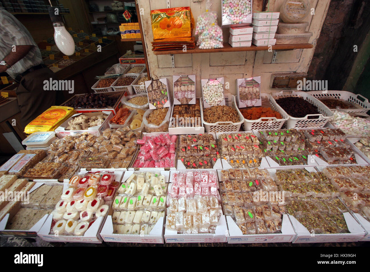 Candy shop in the souq of the Muslim Quarter in the Old City Jerusalem, IL. Souqs are ...