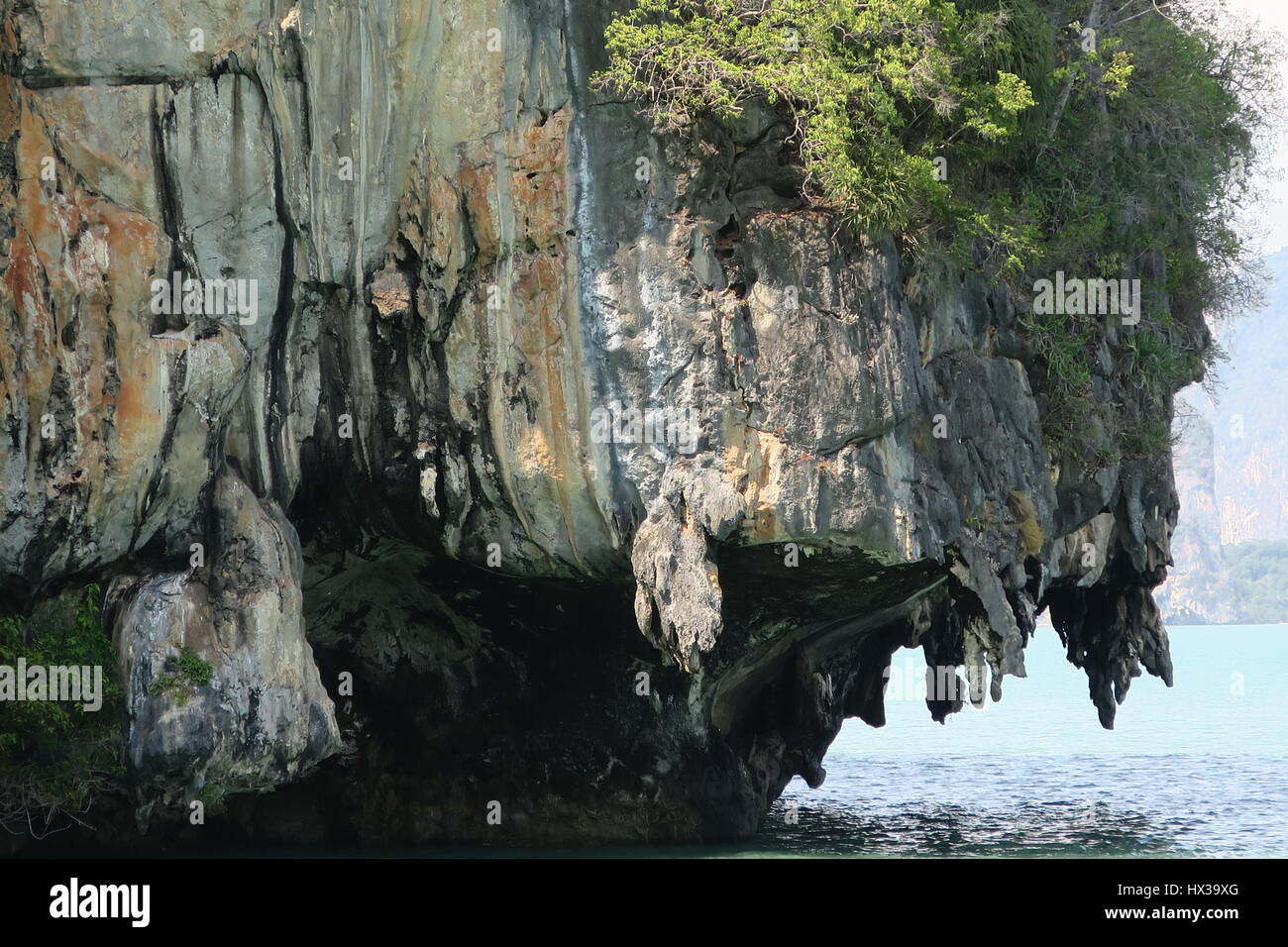 Mighty rock near Sandy beach island in Thailand Stock Photo - Alamy
