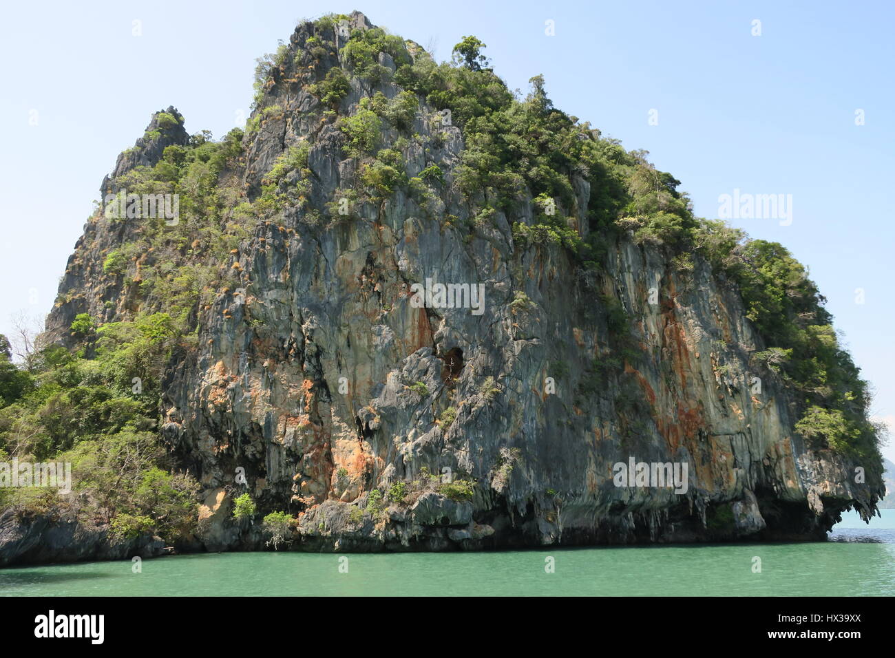 Mighty rock near Sandy beach island in Thailand Stock Photo - Alamy