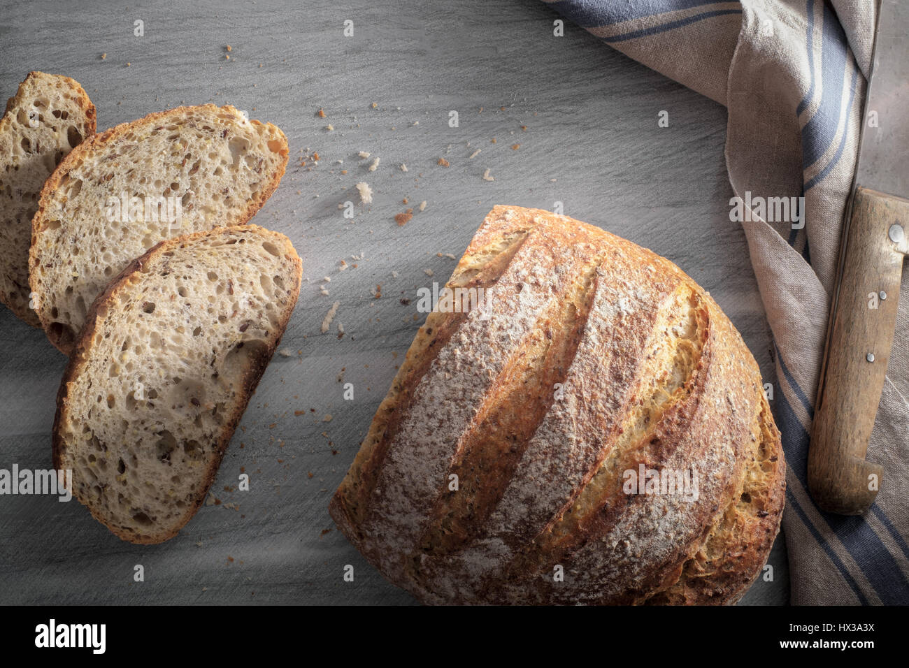 Sliced Artisan loaf of bread - from above Stock Photo - Alamy