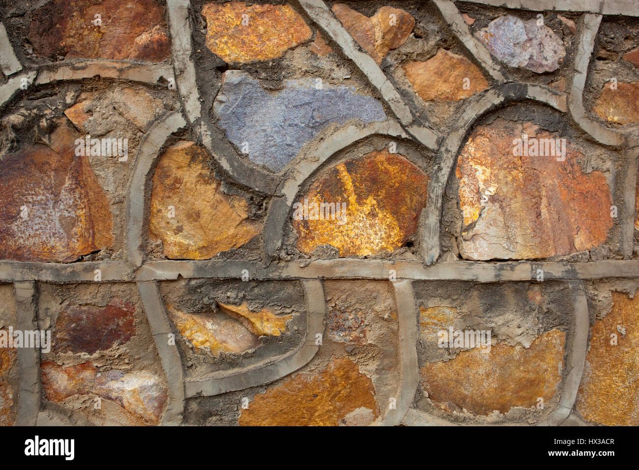 a fancy rustic stone wall background with curved cement seams Stock ...