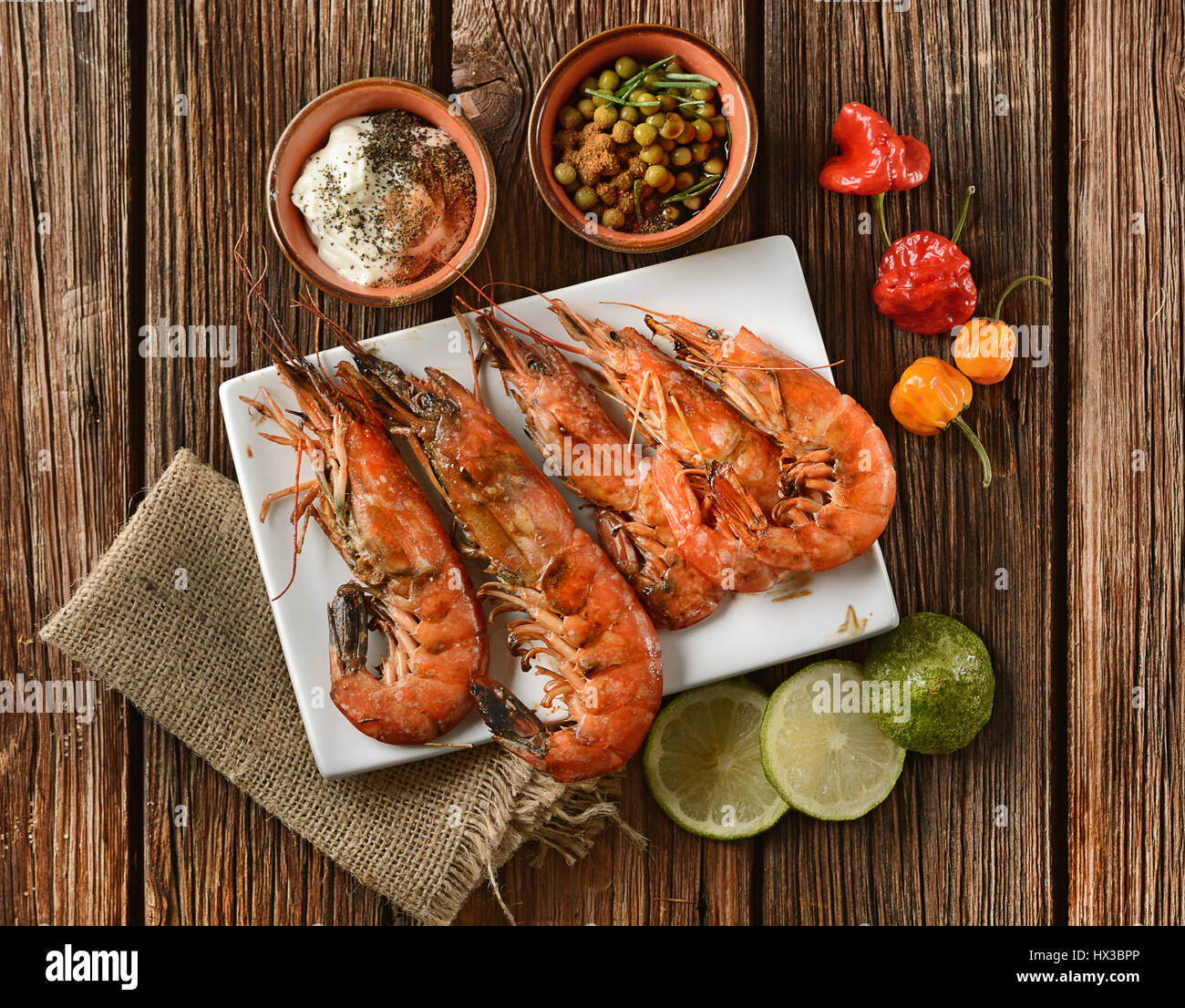 roasted red prawns with ingredients around - closeup Stock Photo - Alamy