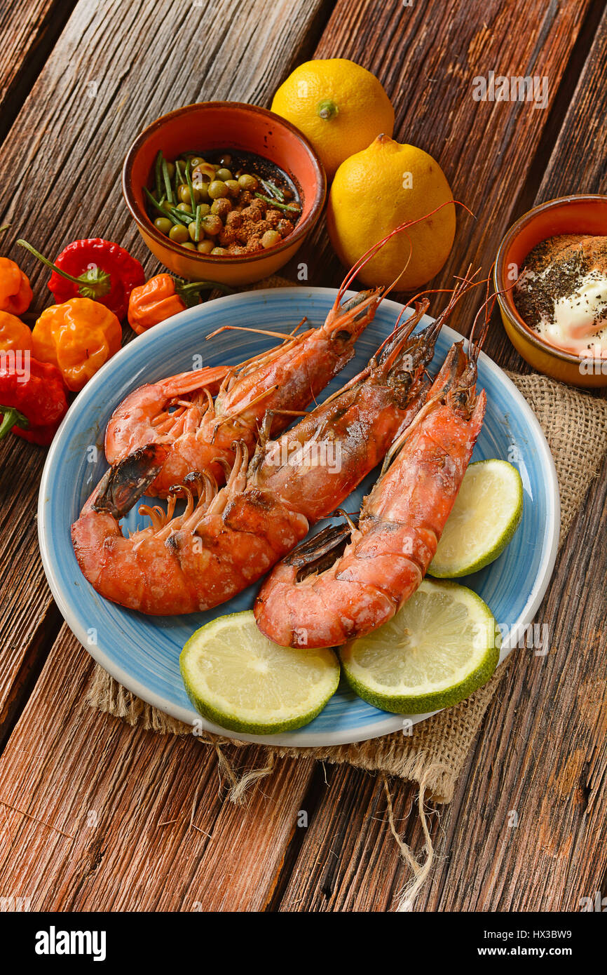 roasted red prawns with ingredients around - closeup Stock Photo - Alamy