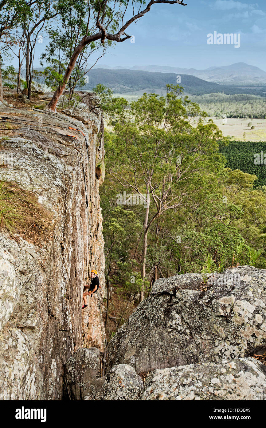 Child climbing down rock hi-res stock photography and images - Alamy