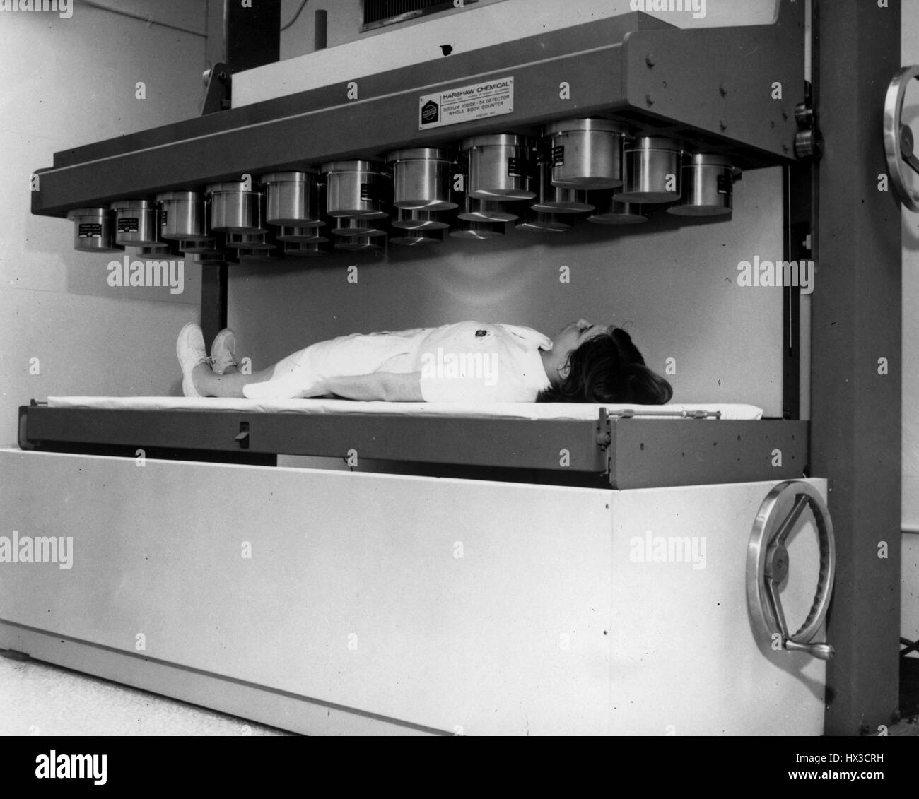 A nurse simulates a patient in the multi-crystal low level whole body ...