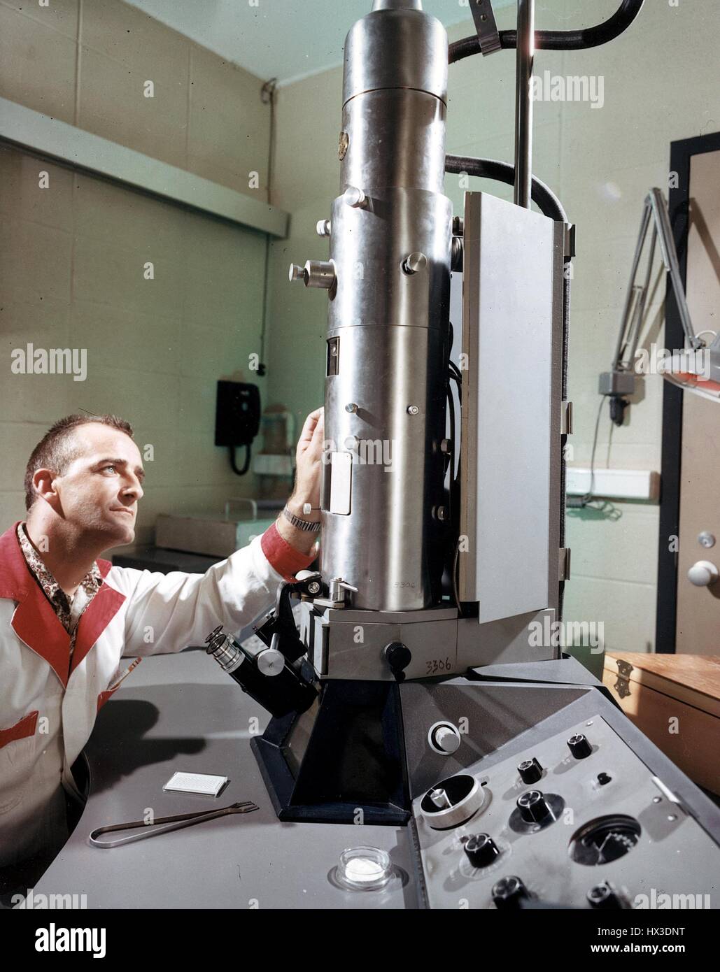A researcher operates an electron microscope, 1966. Image courtesy US ...