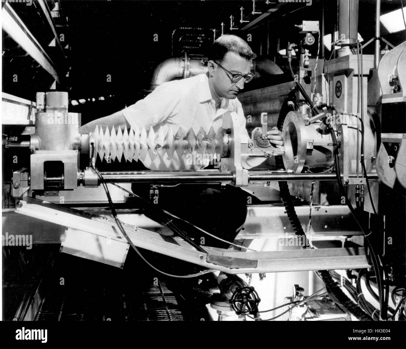 A chemist places a copper target in an Alternating Gradient Synchrotron ...