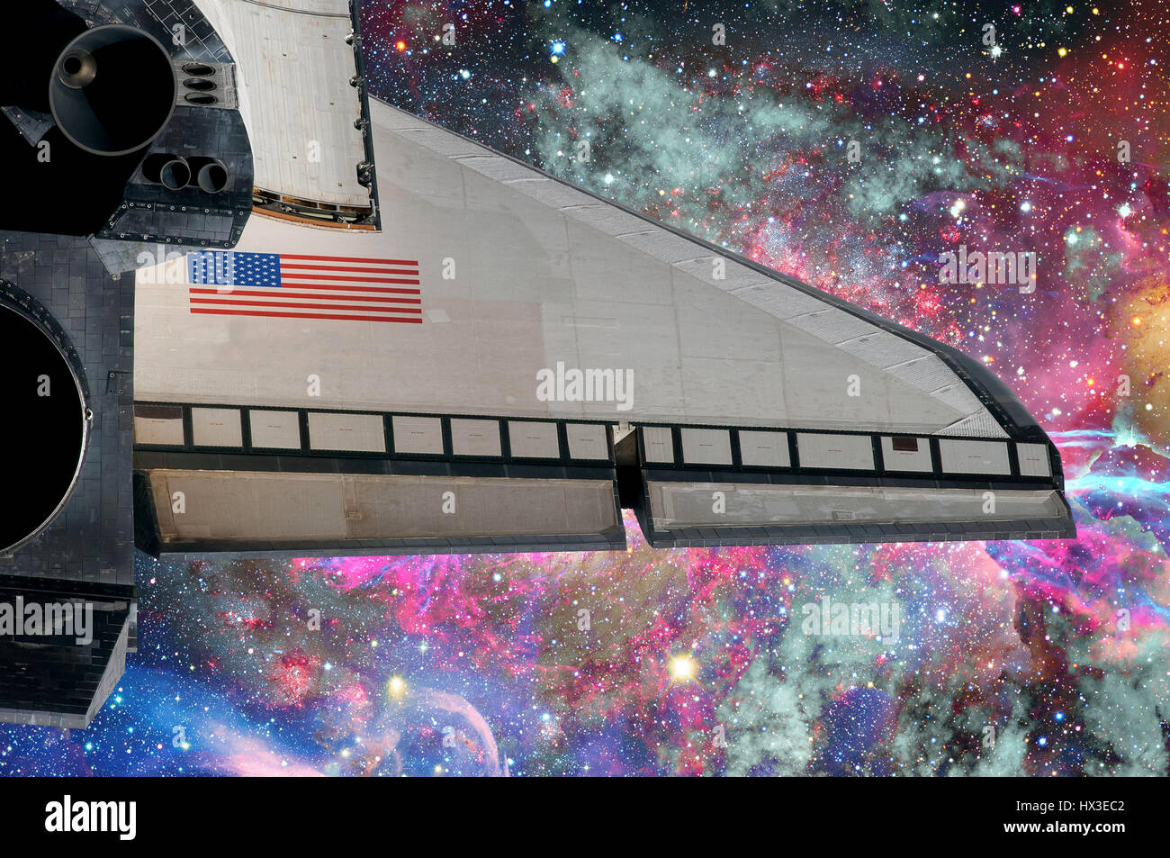 Space Shuttle over galaxy and space nebula Stock Photo - Alamy