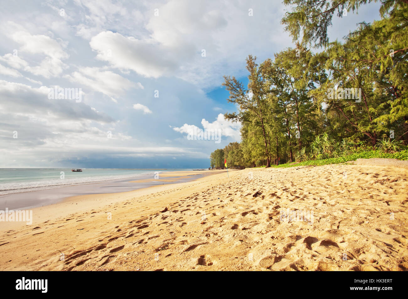 Tropical beach in ebb time in sunset lights Stock Photo - Alamy