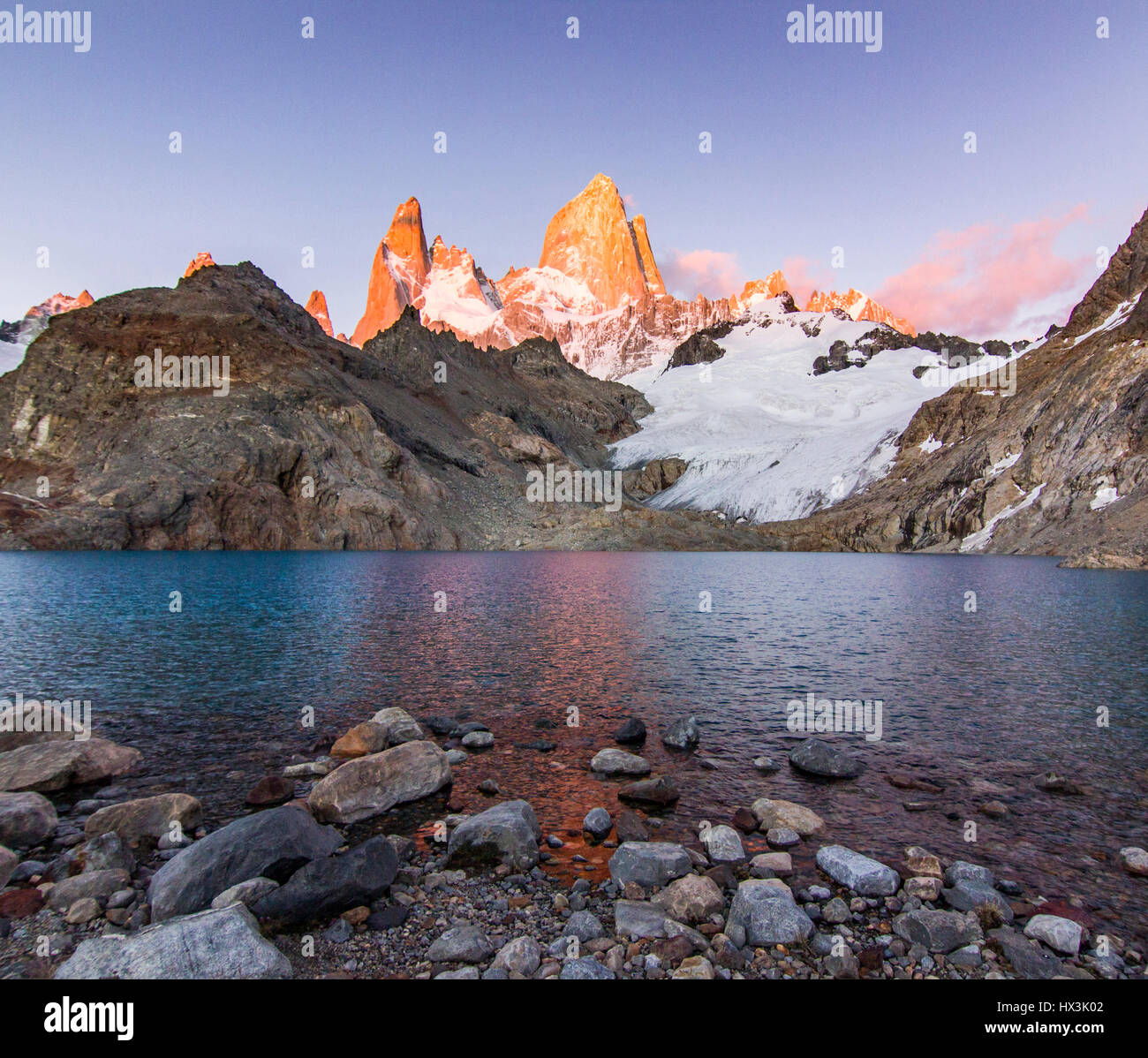 Fitz Roy mountain and lake at red sunrise Stock Photo - Alamy