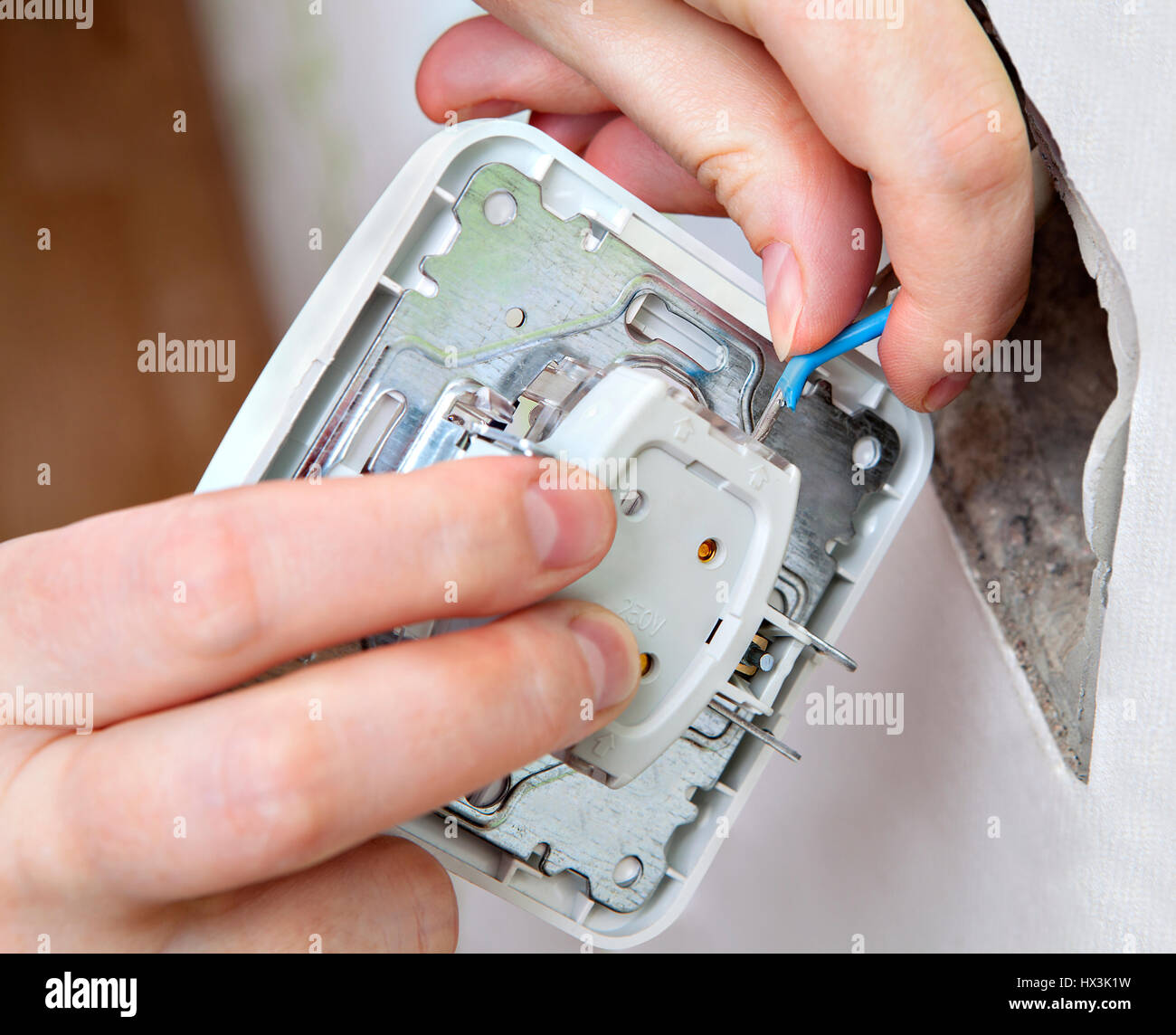 installation, light switches inside wall, close-up Stock Photo - Alamy