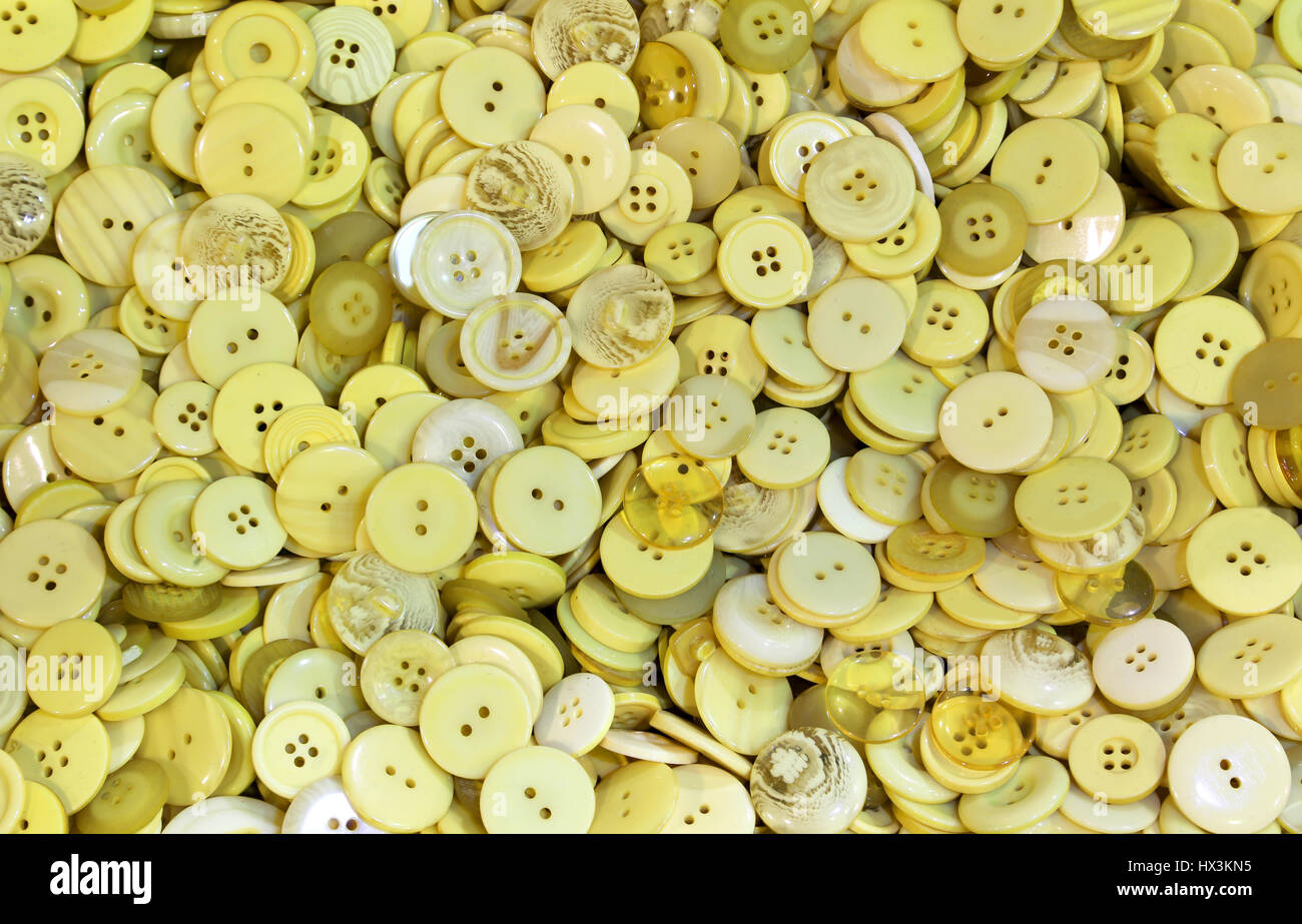 background of light yellow button in the store Stock Photo - Alamy